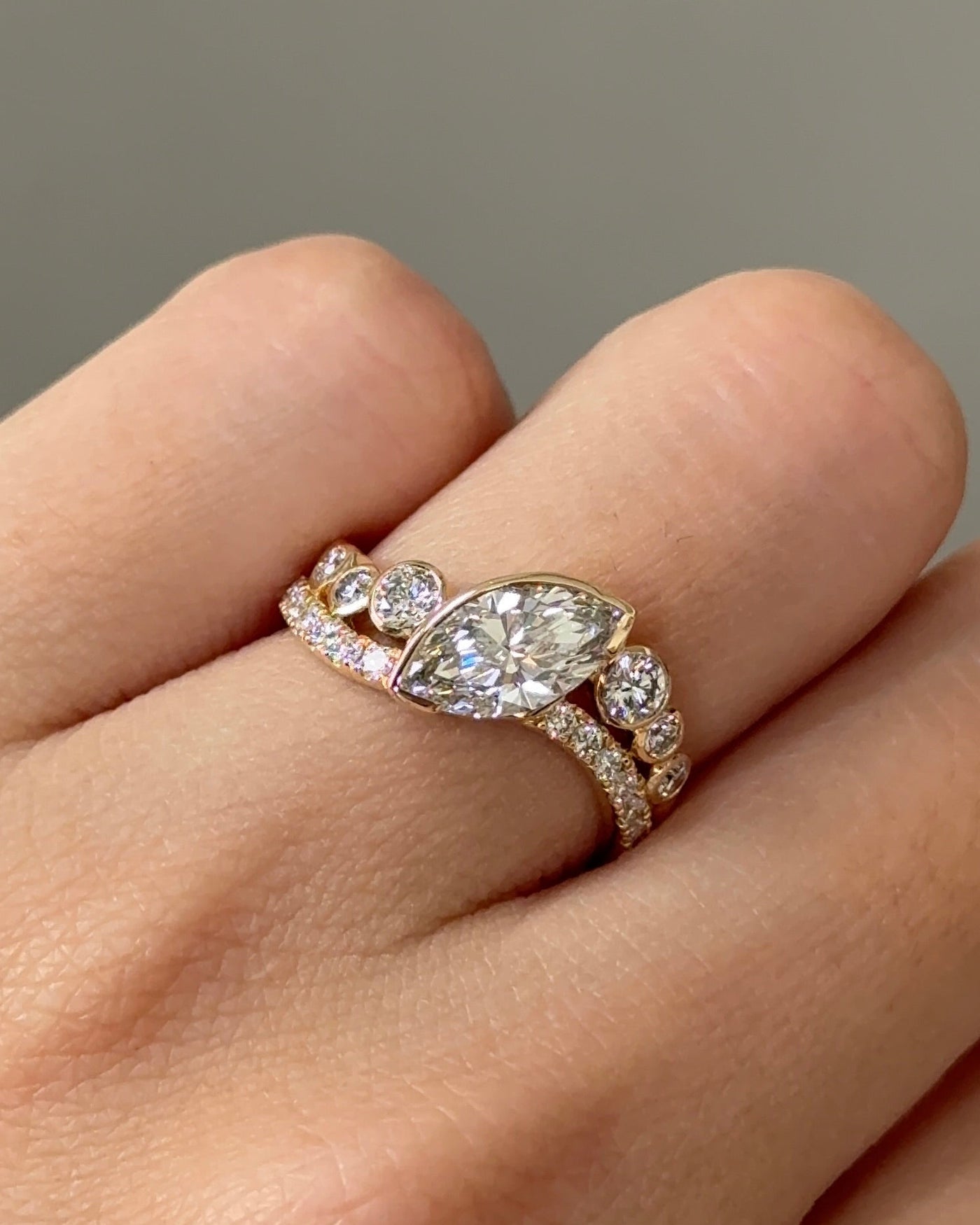 1 carats Marquise cut Diamond Bezel Arc Curvy Ring with Round Pave Acc